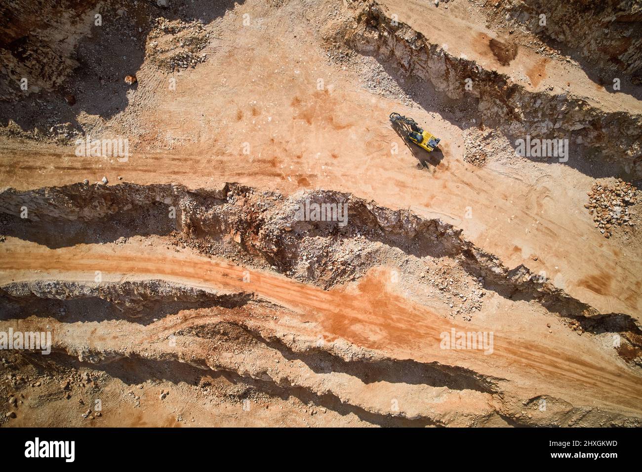 Ledges of a quarry after blasting and drilling operations Stock Photo ...