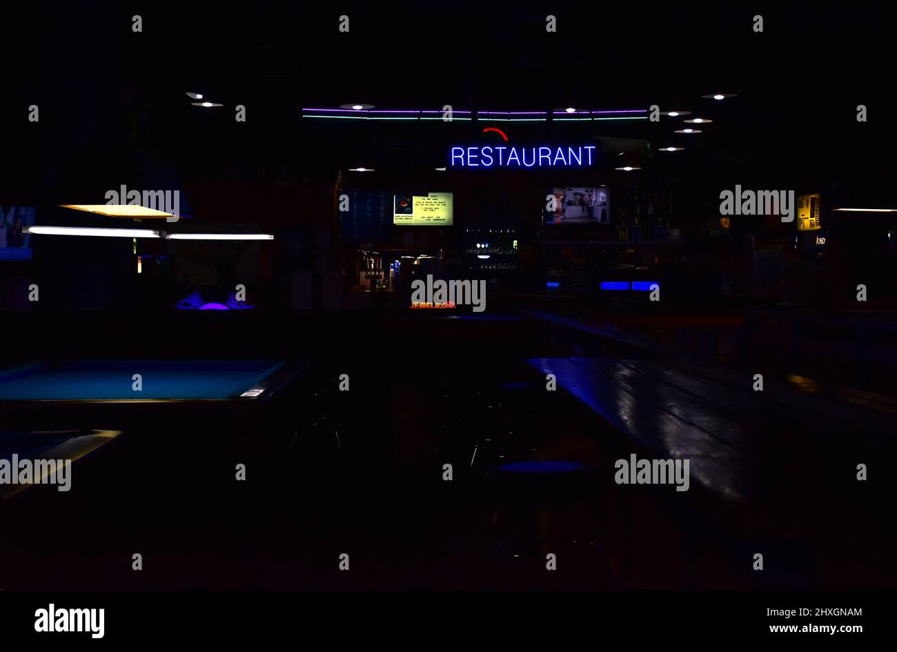 Dark Moody Billiard Hall and Restaurant Interior with Colored Lights ...