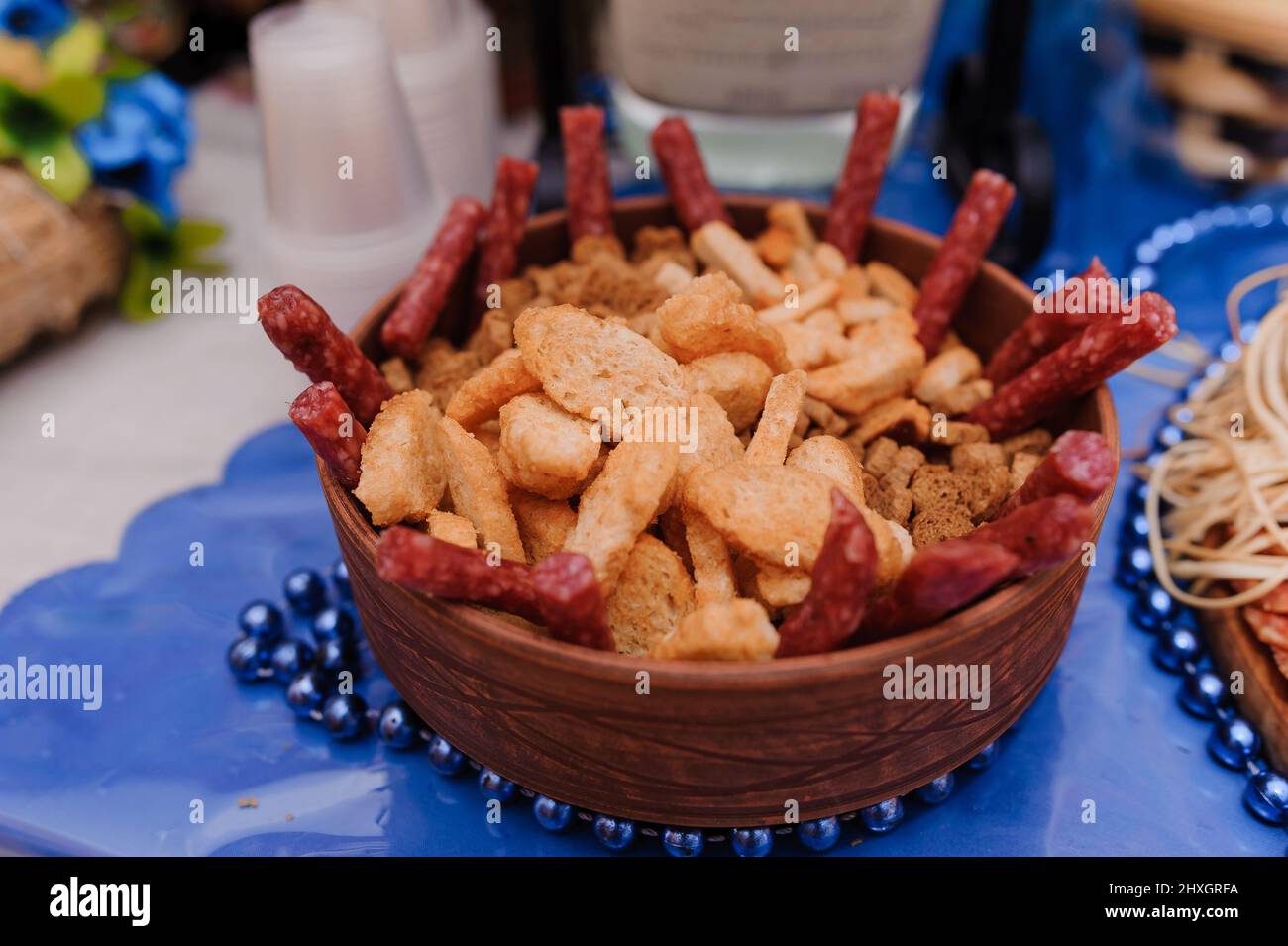 Slicing different types of meat. Meat snacks on the table. wedding ...