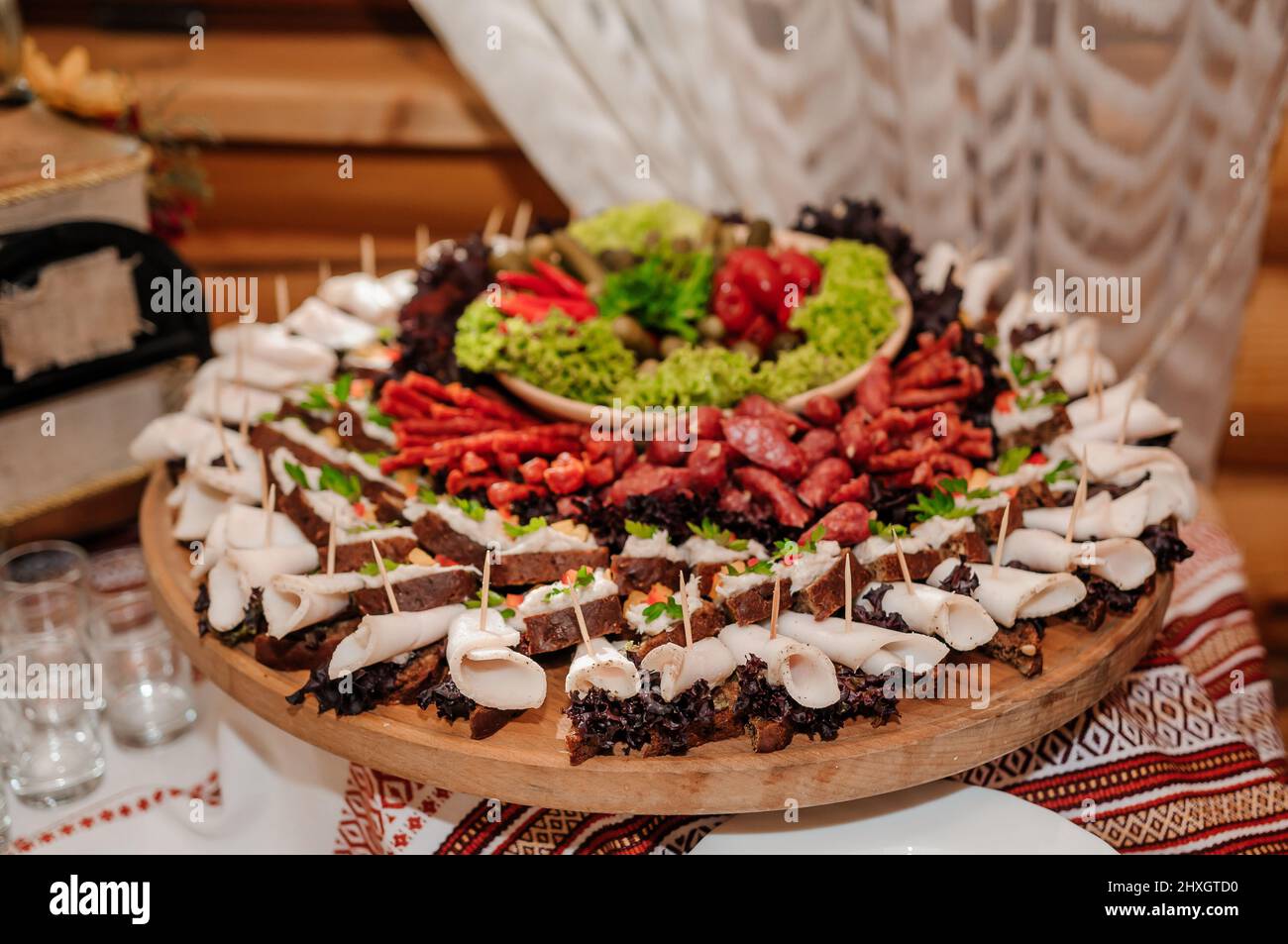 Slicing different types of meat. Meat snacks on the table. wedding ...