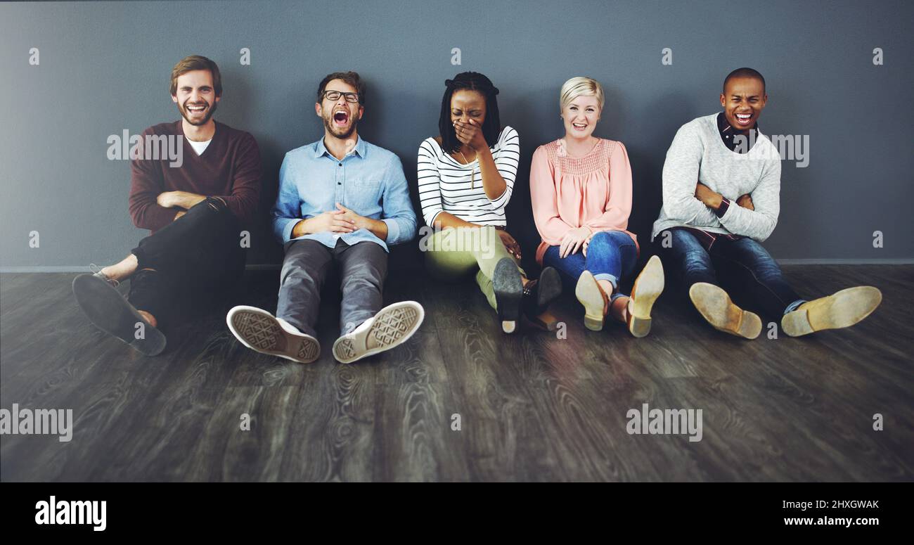 Those belly laughs that only best friends give. Studio shot of a ...