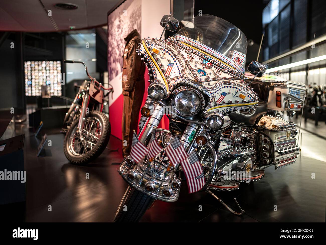 motorcyle decorated by Russ Townsend with red, blue and white ...