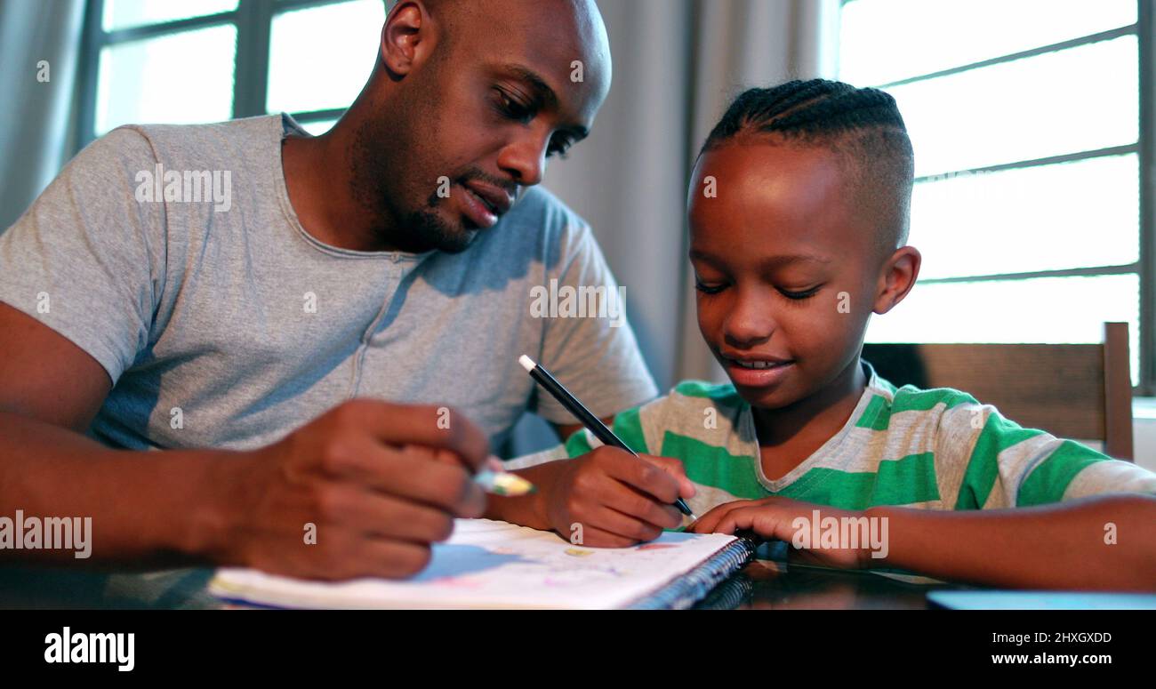 Black dad son homework hi-res stock photography and images - Alamy