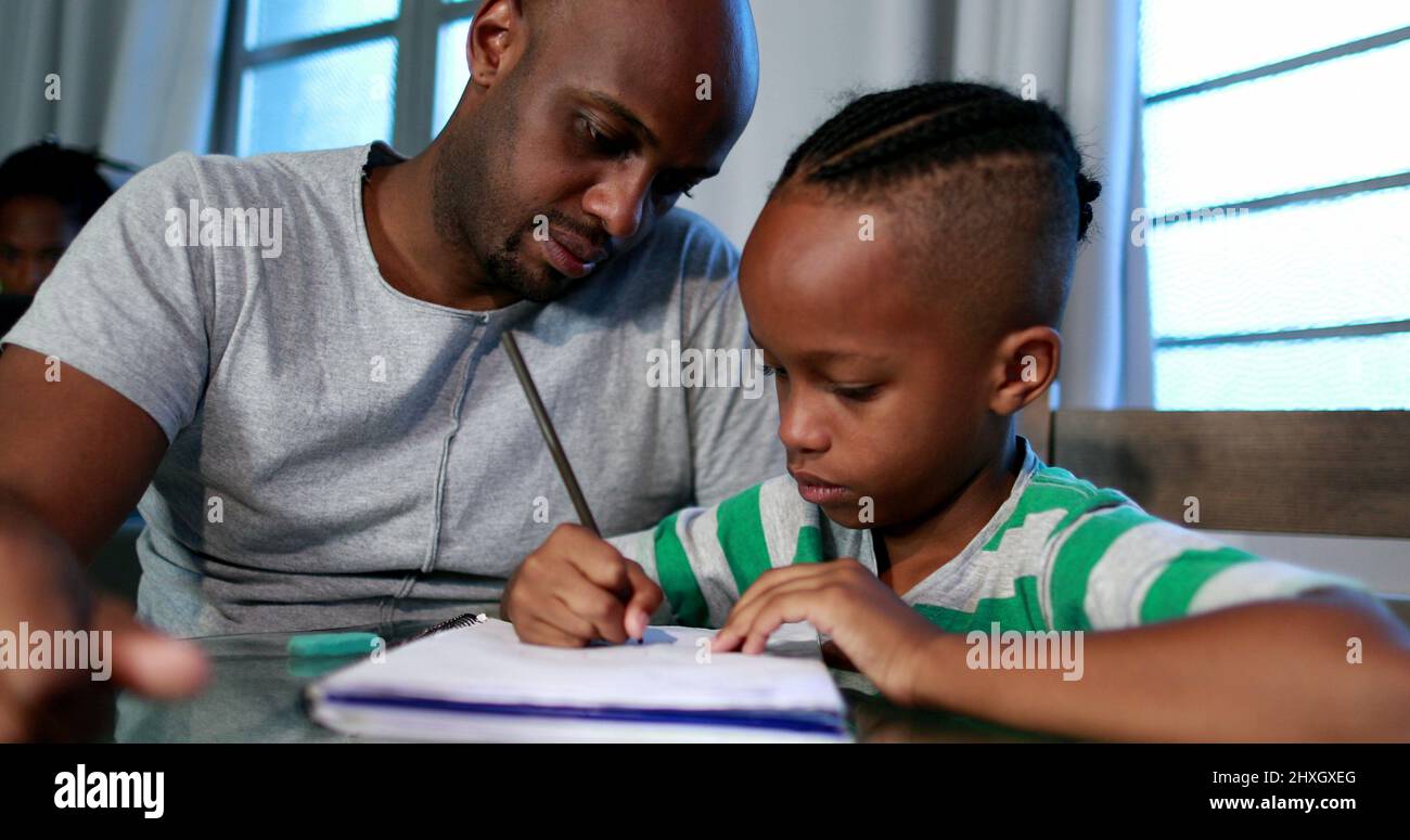 Father mentoring son, dad helping kid with homework study Stock Photo ...