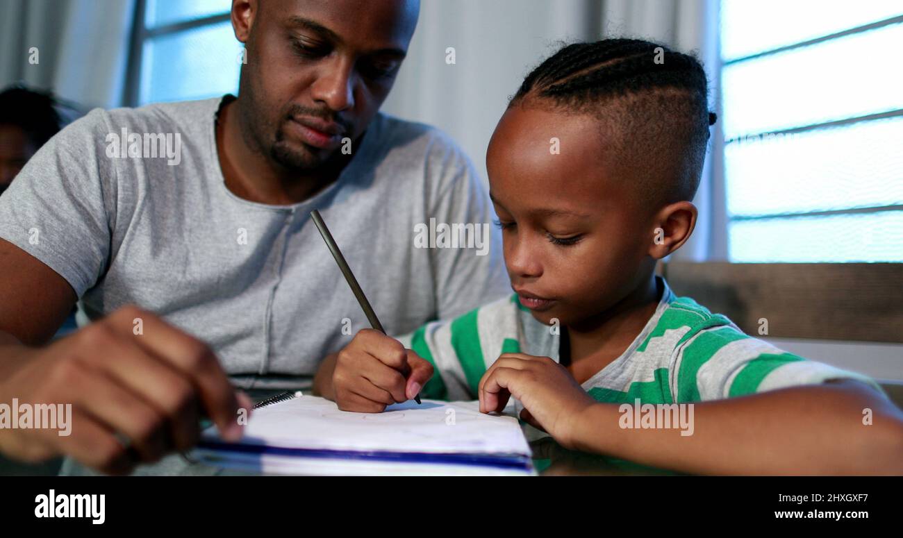 Father mentoring son, dad helping kid with homework study Stock Photo ...