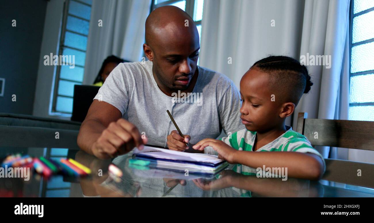 Father mentoring son, dad helping kid with homework study Stock Photo ...