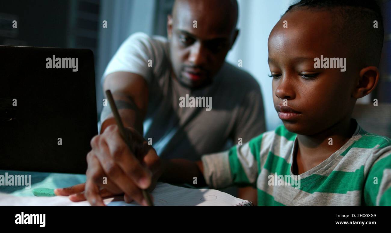 Father mentoring son, dad helping kid with homework study Stock Photo ...