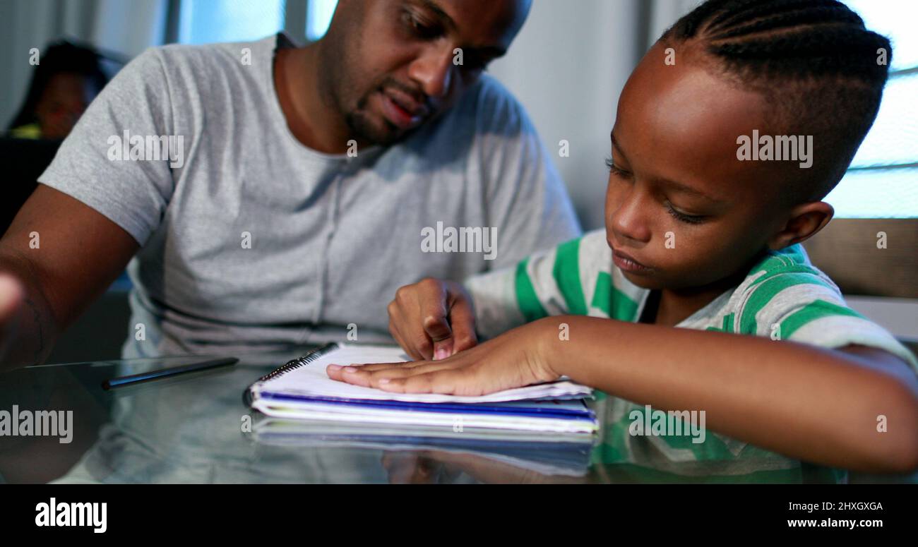 Father mentoring son, dad helping kid with homework study Stock Photo ...