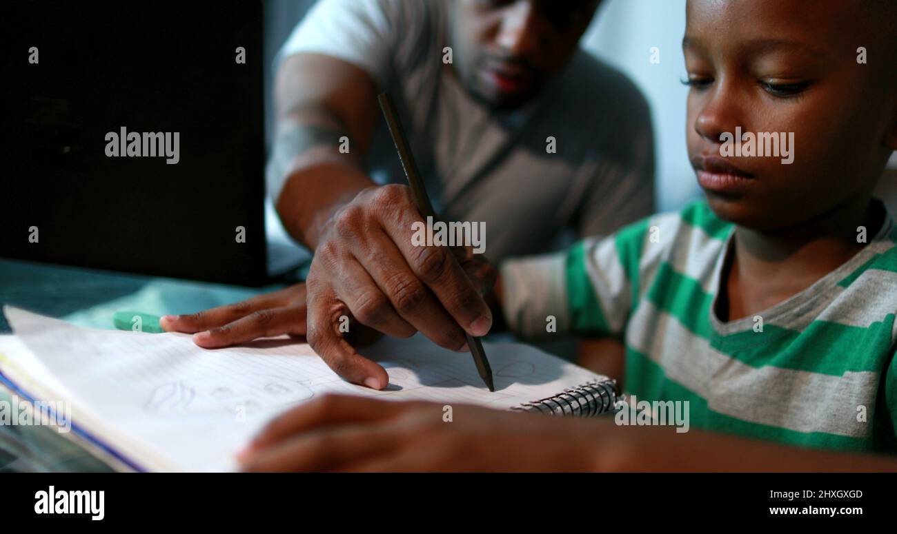 Father mentoring son, dad helping kid with homework study Stock Photo ...
