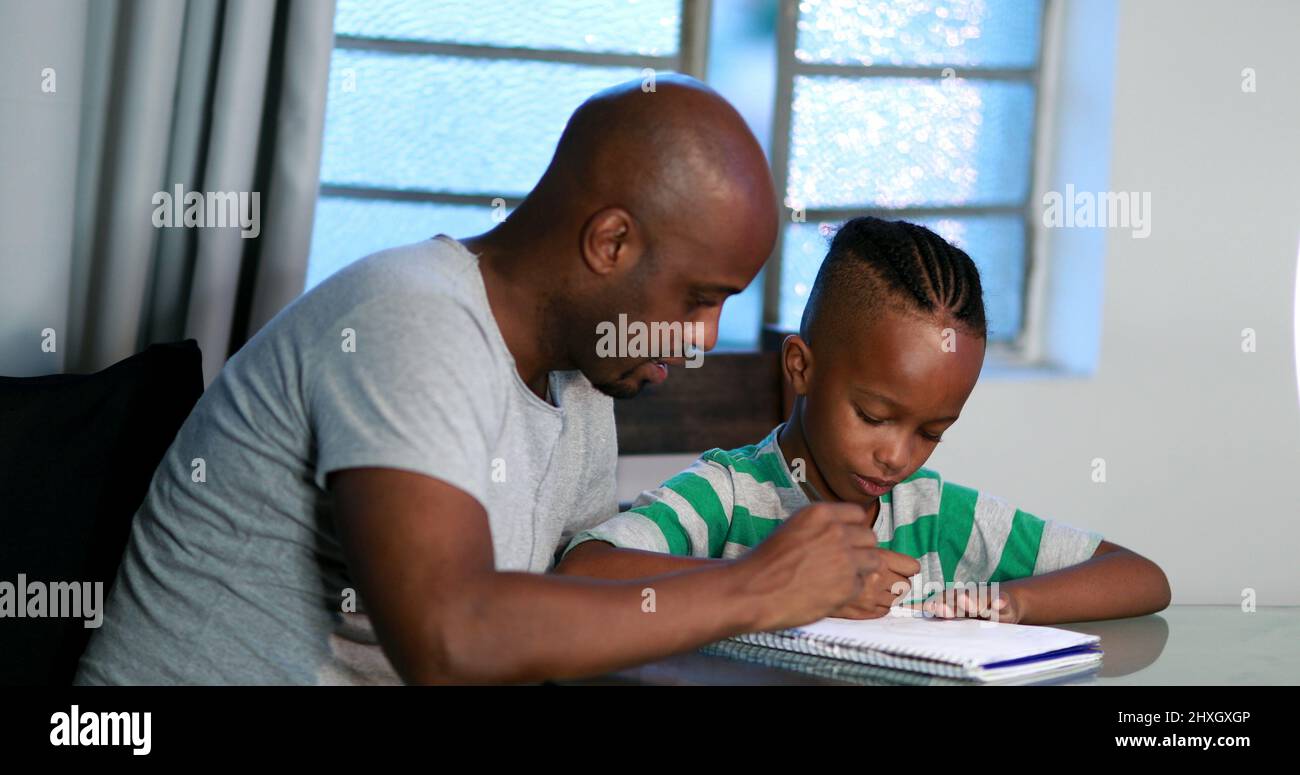 Father mentoring son, dad helping kid with homework study Stock Photo ...