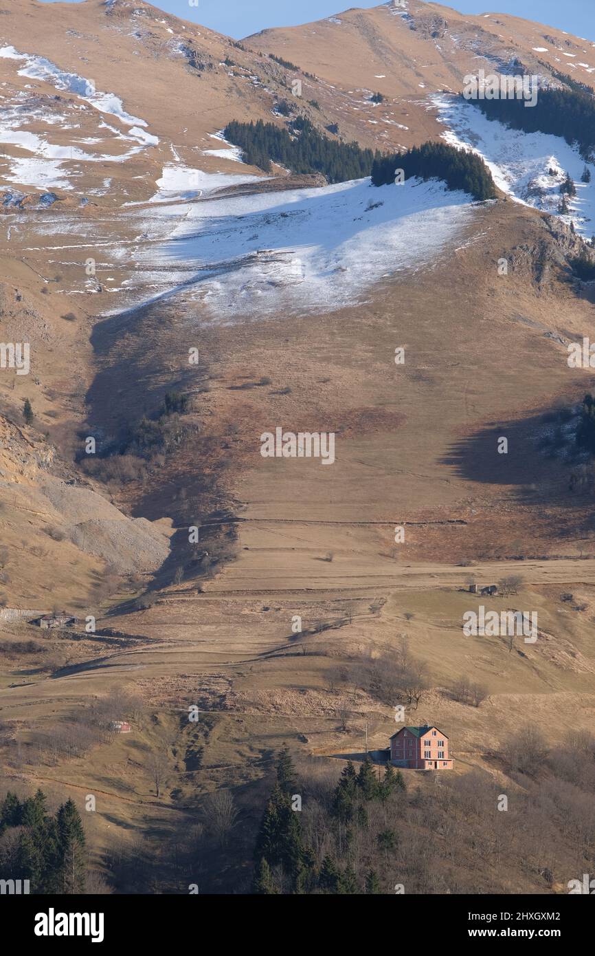 single village house at winter and bottom and footprint of mountain ...