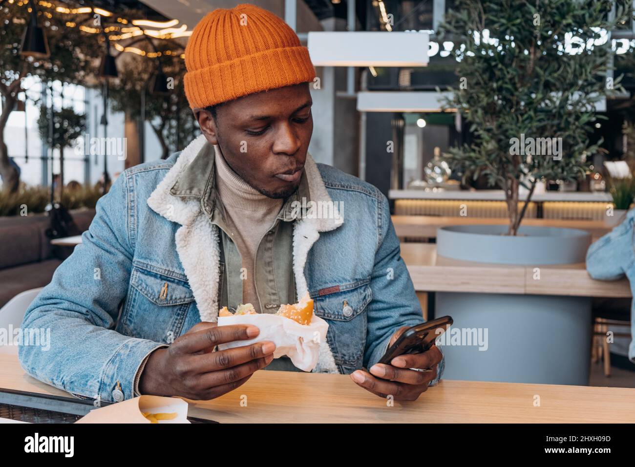 Guy in orange hat hi-res stock photography and images - Alamy