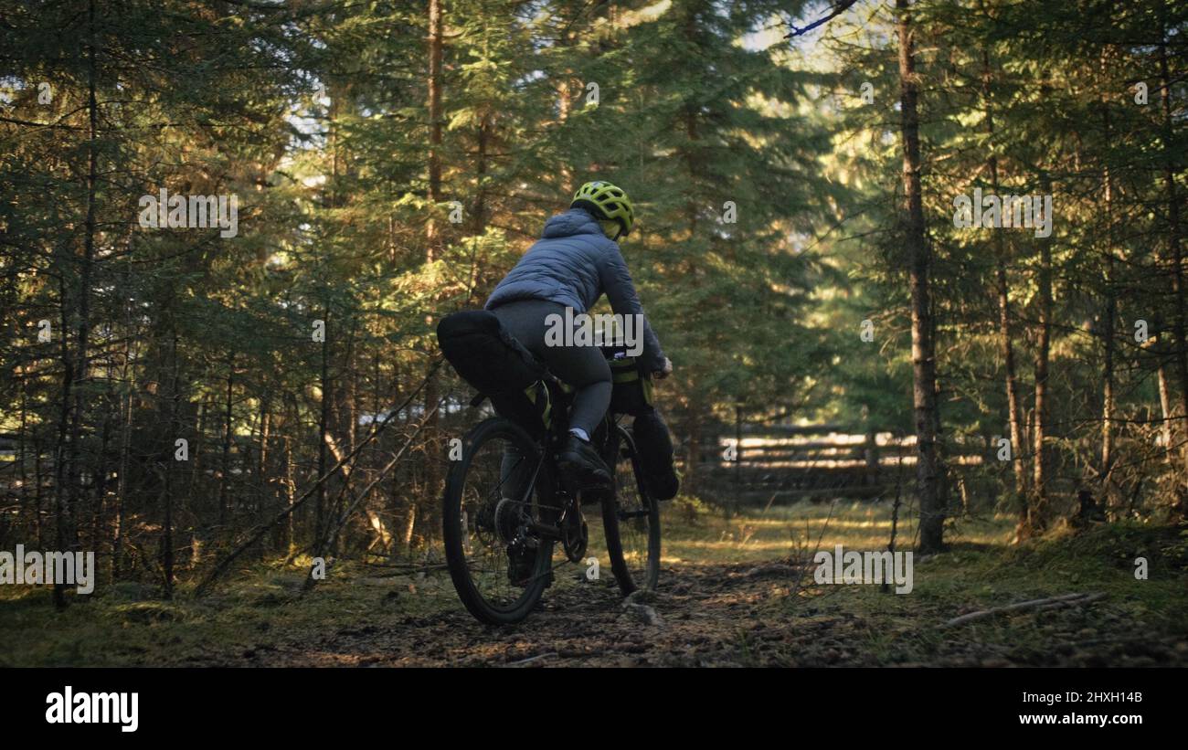 The woman travel on mixed terrain cycle touring with bike bikepacking ...