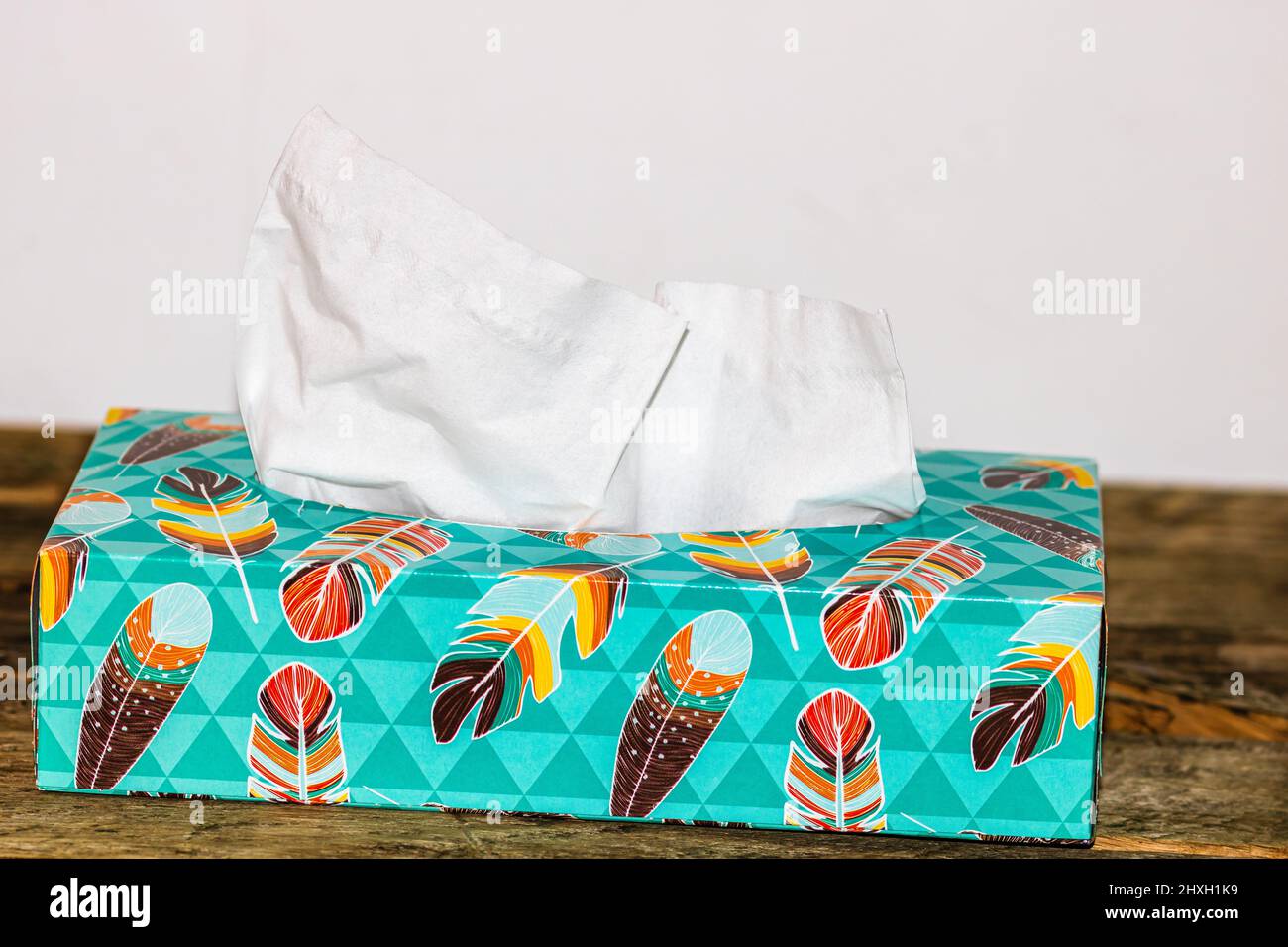 Box of white paper tissues on table Stock Photo - Alamy