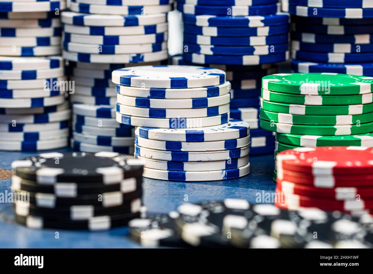 Stacks of poker chips detail with cards Stock Photo - Alamy