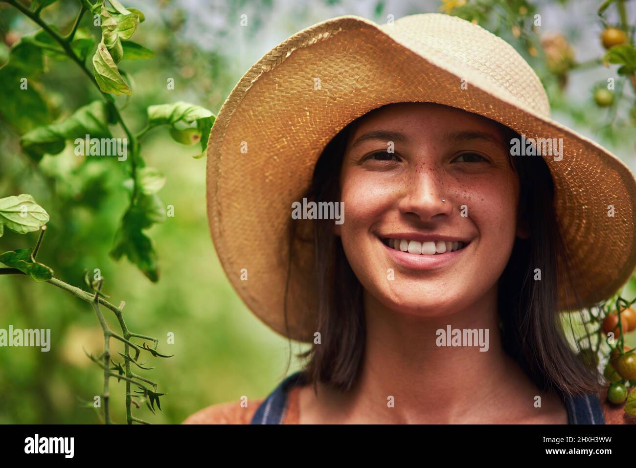 Im at my happiest when Im in the fields. Portrait of an attractive ...