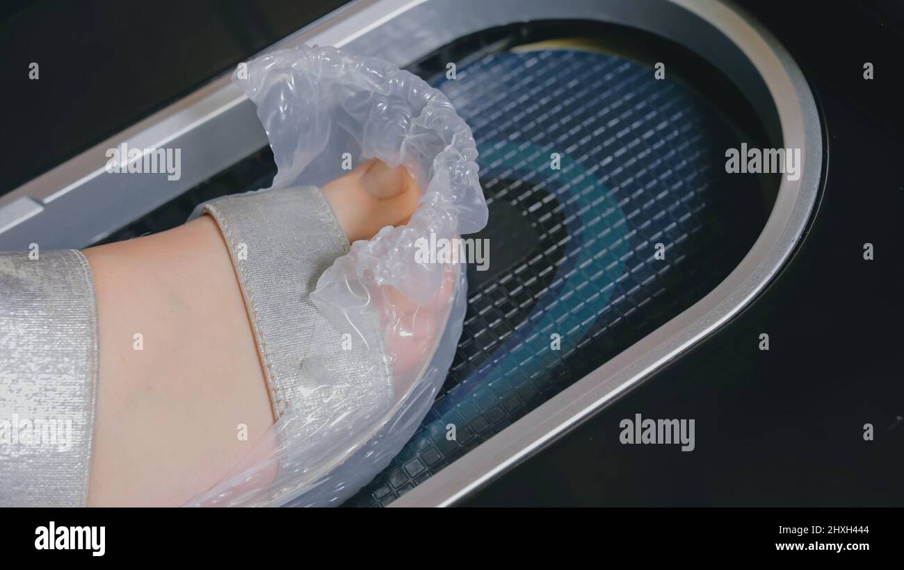 Automatic Thermal Shrinkable Shoe Cover Laminating Machine. Close up ...