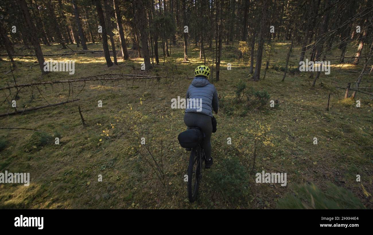 The woman travel on mixed terrain cycle touring with bike bikepacking ...