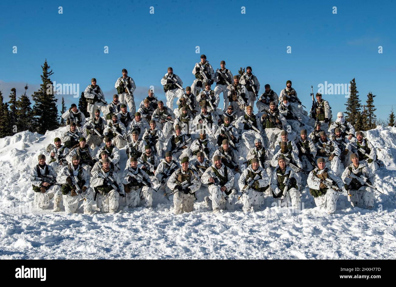 Members of the 3rd Battalion, Royal 22e Régiment Canadian Army gather ...