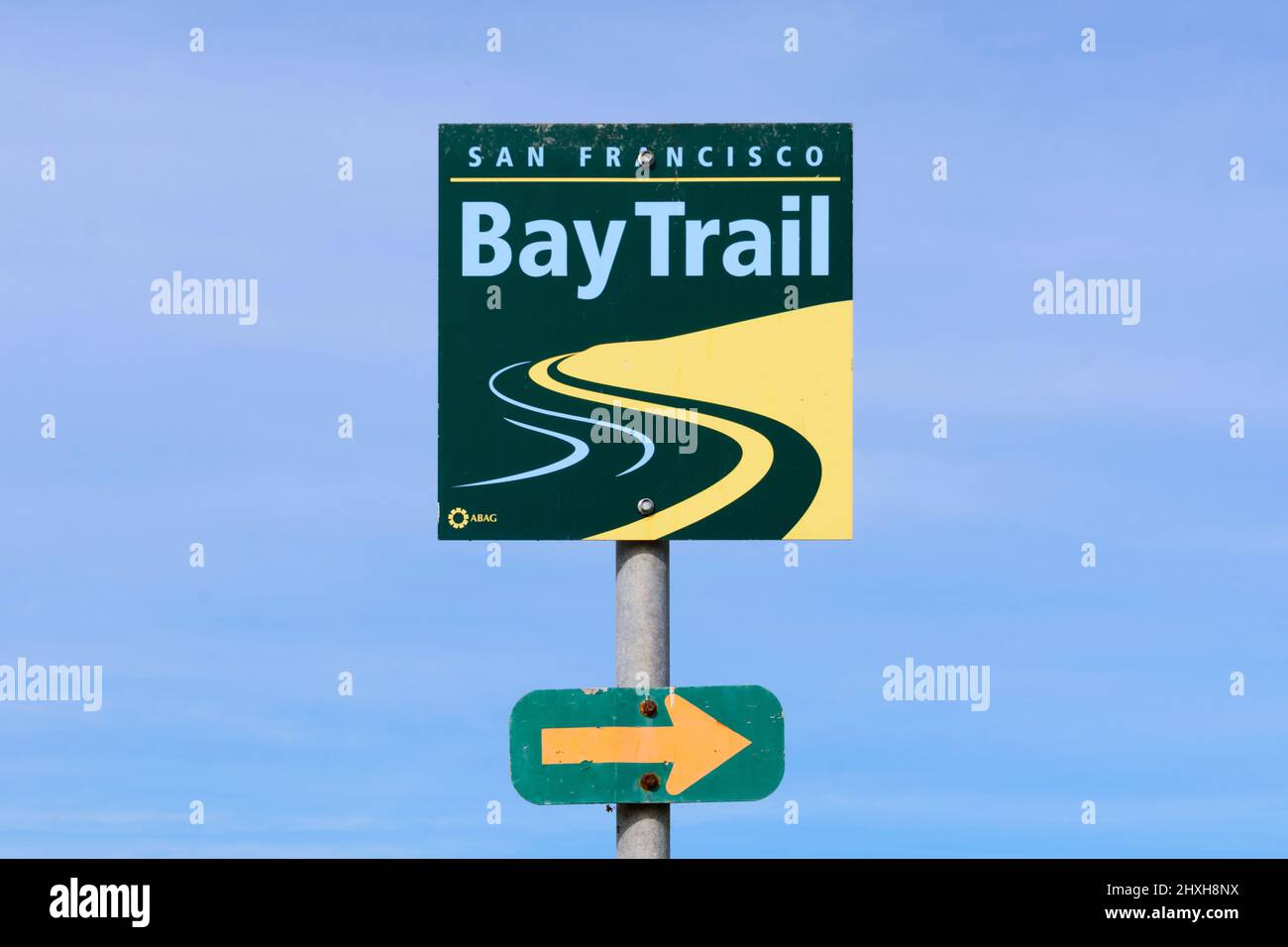 San Francisco Bay Trail sign with directional arrow. Blue sky ...