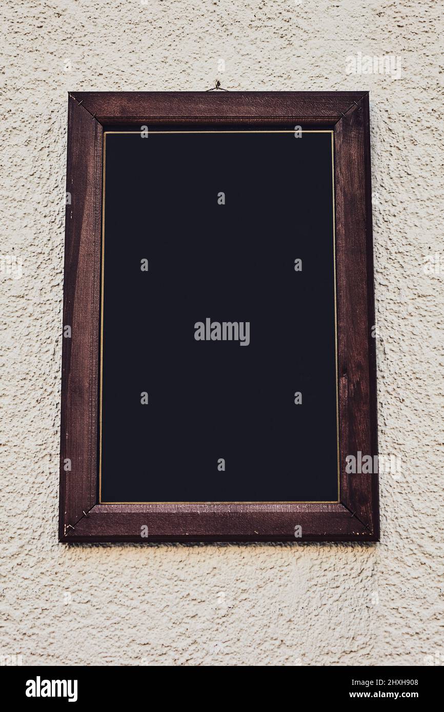 Add and share. Cropped shot of a blank sign hanging outside Stock Photo ...
