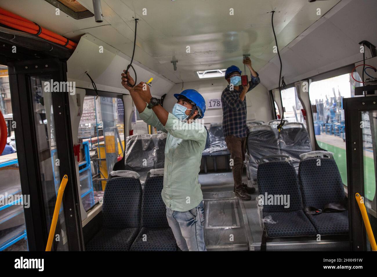 Hyderabad, India's Telangana state. 12th Mar, 2022. Workers of Megha ...