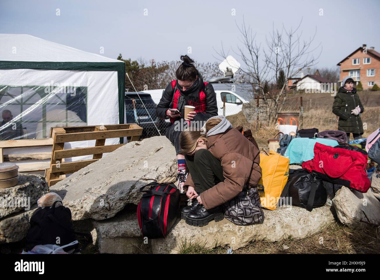 Medyka, Poland. 12th Mar, 2022. Ukrainian refugees are seen resting at ...