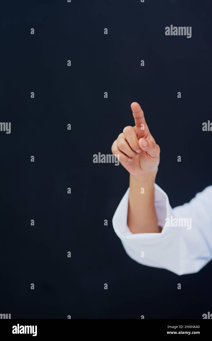 One touch is all it takes. Cropped shot of an unrecognizable female ...