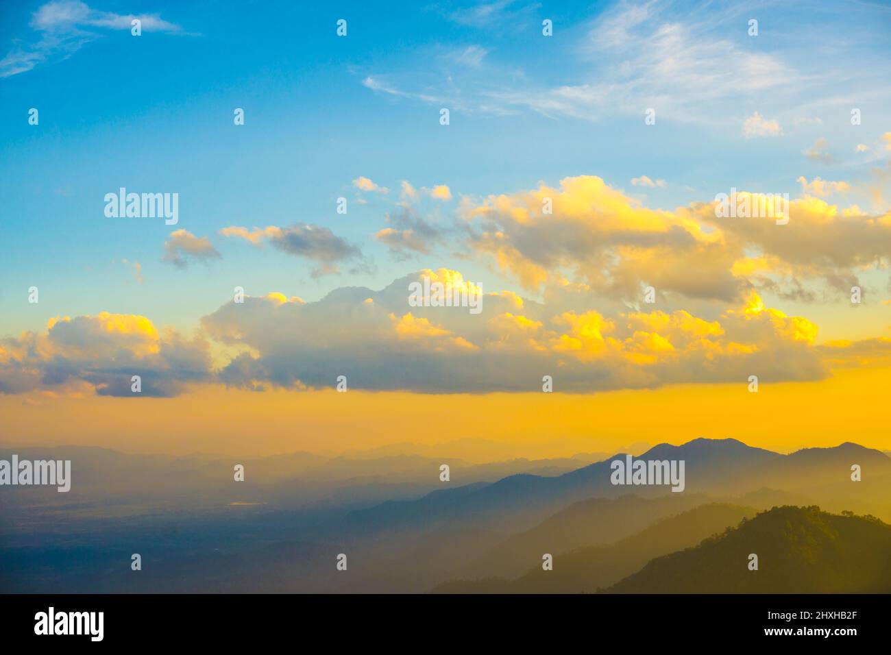Mountain sunset light with green tropical forest nature landscape ...