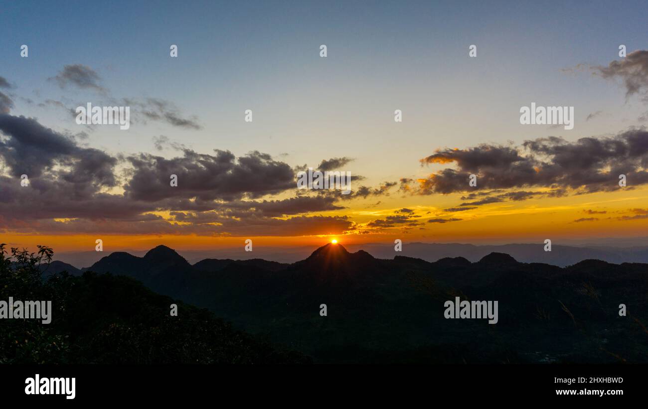 Mountain sunset light with green tropical forest nature landscape ...