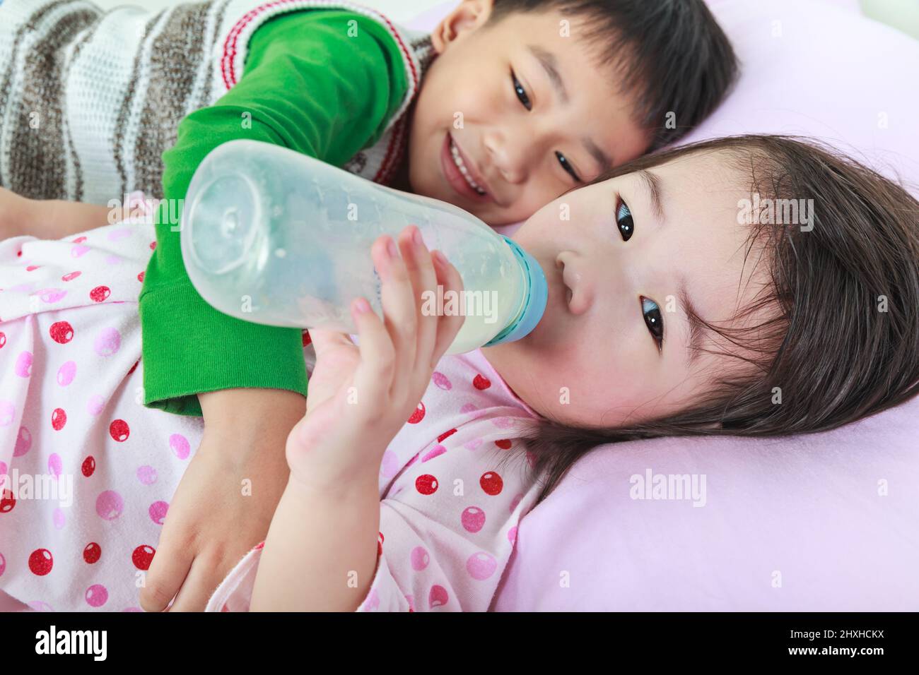 Closeup Asian Sibling Having Happy In Bed Before Sleeping Sister Suck