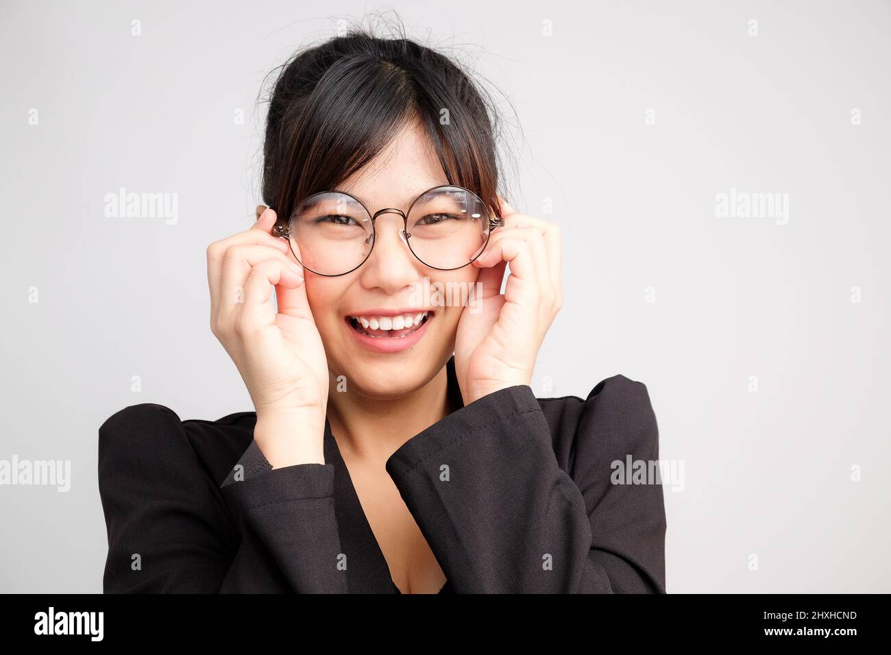 Beautiful attractive business asian women wear eyeglasses smiling on ...