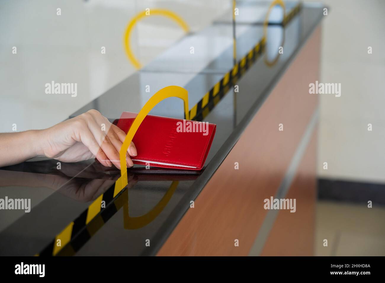 Agent checking passport hi-res stock photography and images - Alamy