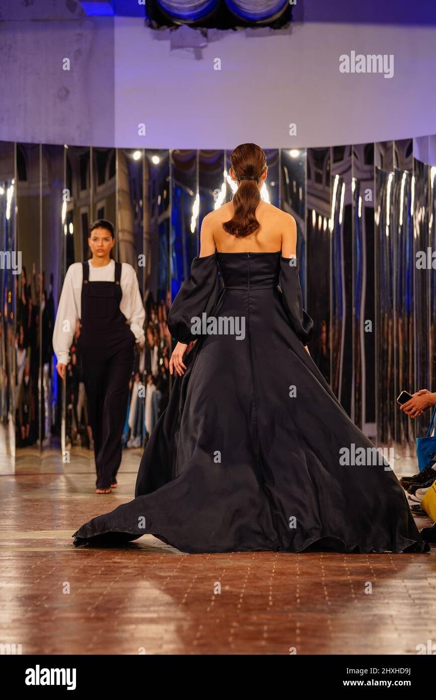 A model walks the runway during Luis Carvalho fashion show at ...