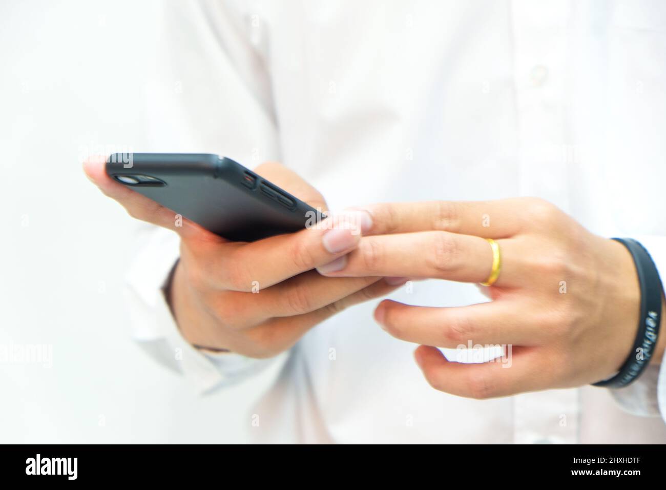 Business man hand use smartphone on white background close up on hand ...
