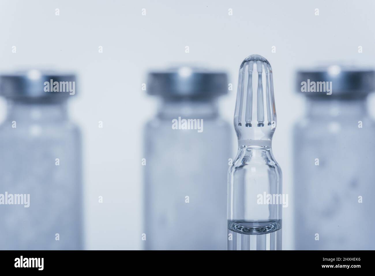 Glass medical ampoule vial for injection. Medicine is liquid sodium ...