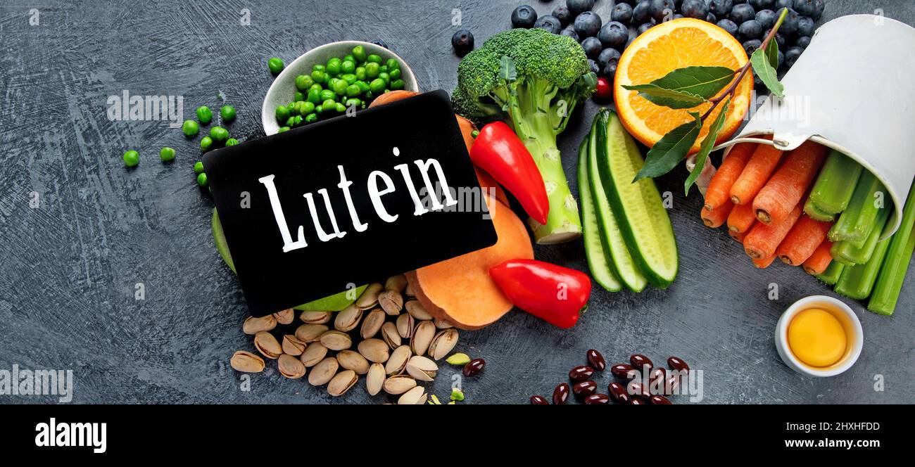 Foods high in lutein on dark background. Food for healthy eyes. High in ...