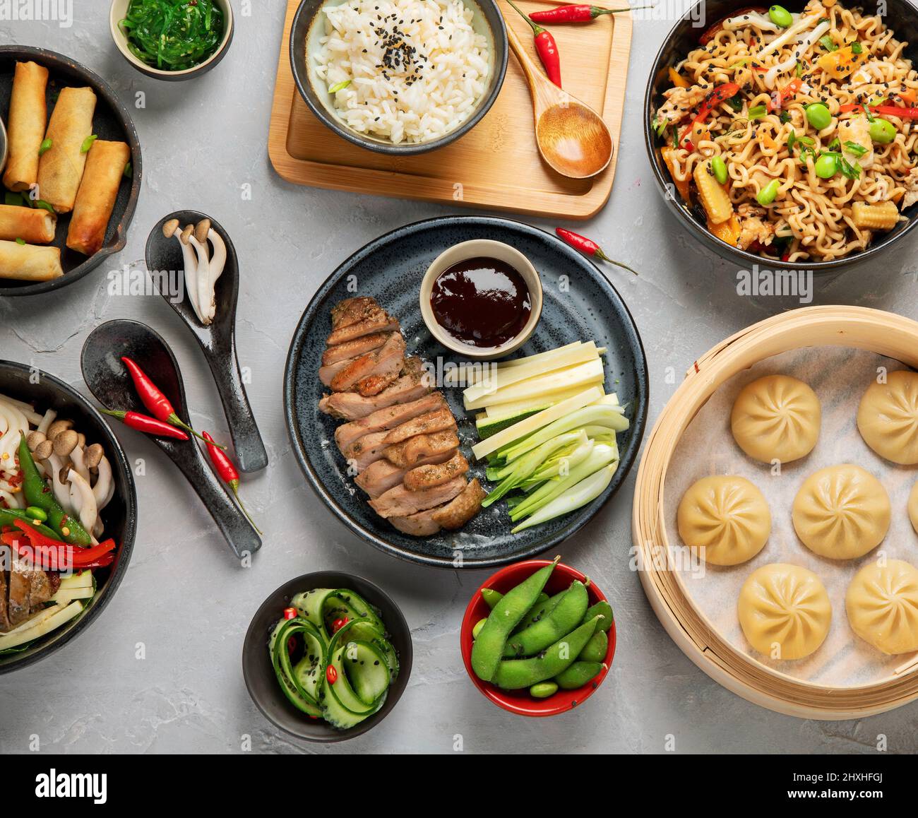 Assorted Chinese food set on light background. Traditional food concept ...