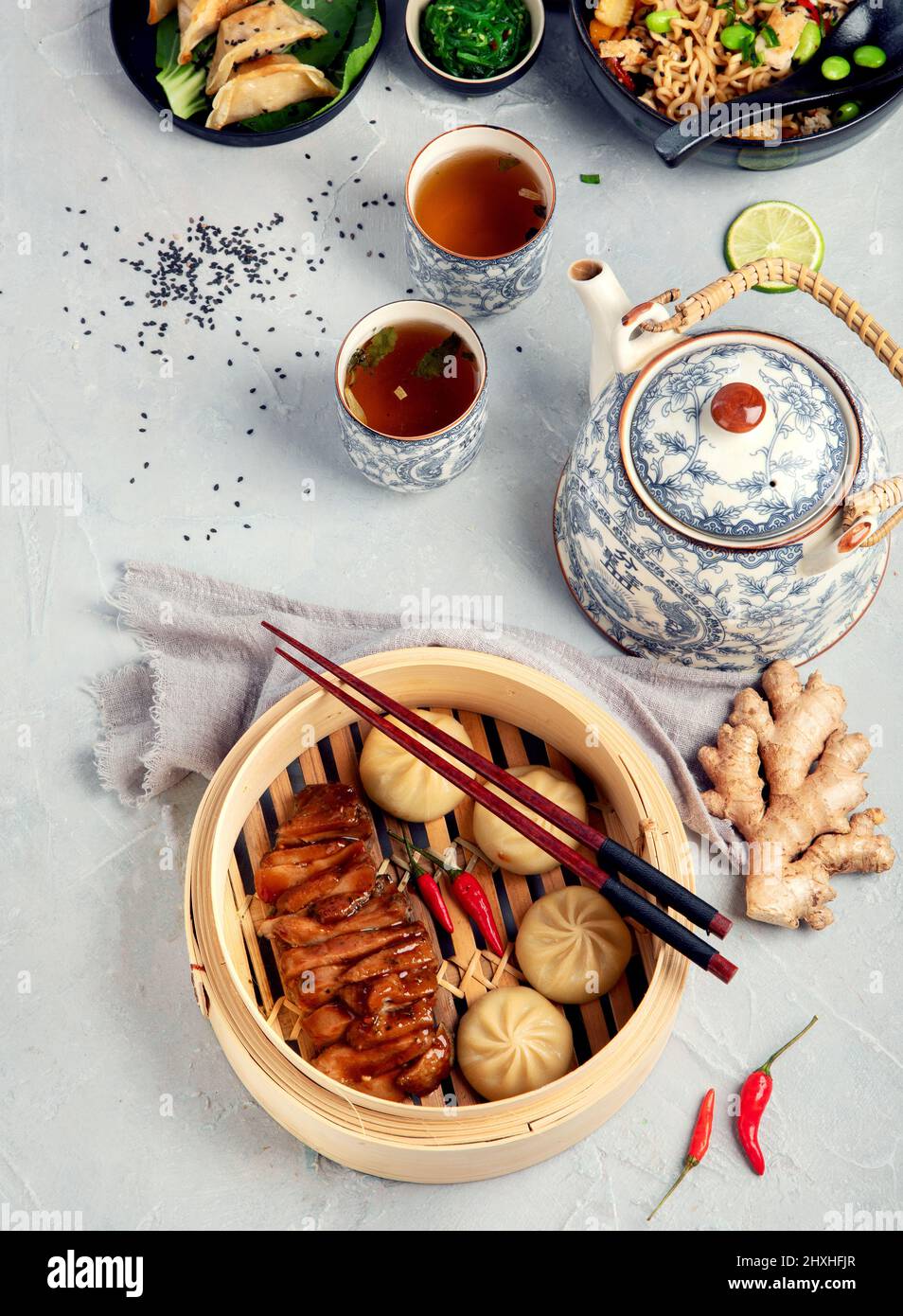 Assorted Chinese food set on light background. Traditional food concept ...