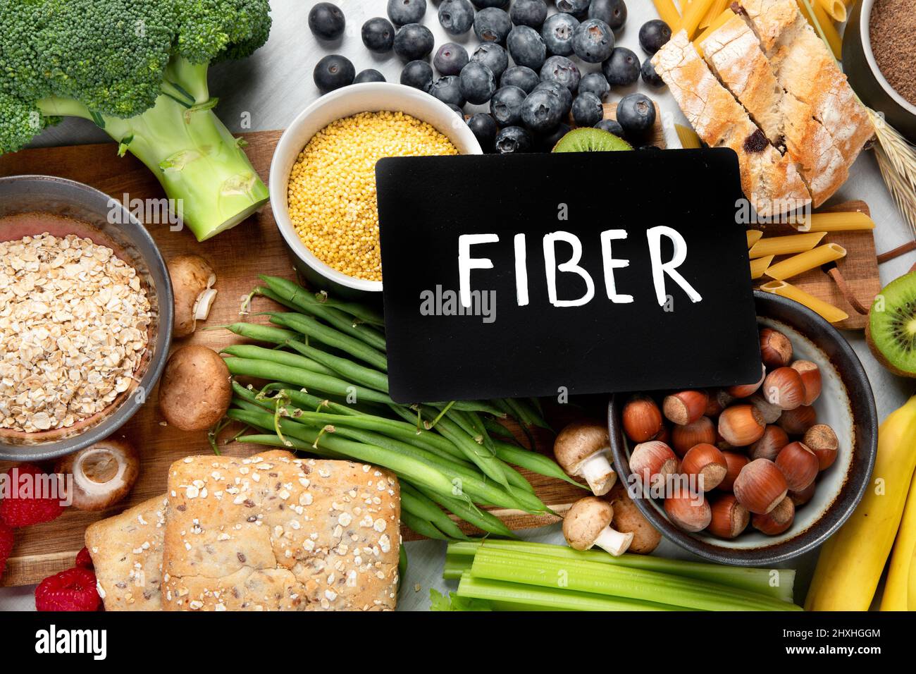 Foods high in fiber on gray background. Healthy food concept. Top view ...