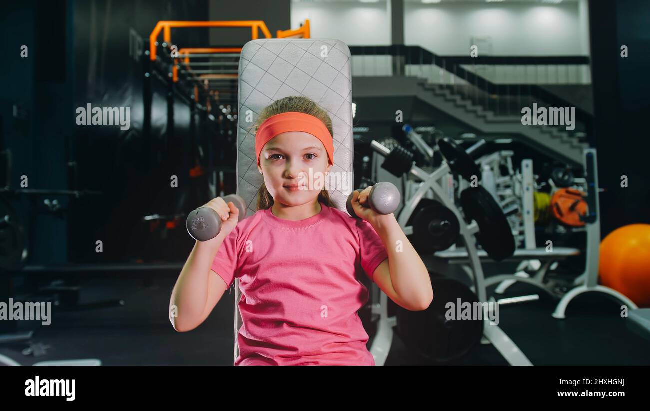 Fit Athletic Baby Girl Work out with Dumbbell, Doing Her Fitness ...