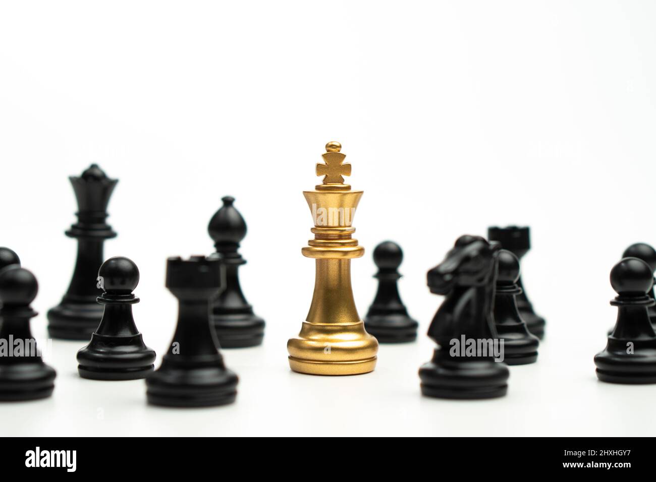 Golden Chess King standing to Be around of other chess, Concept of a ...