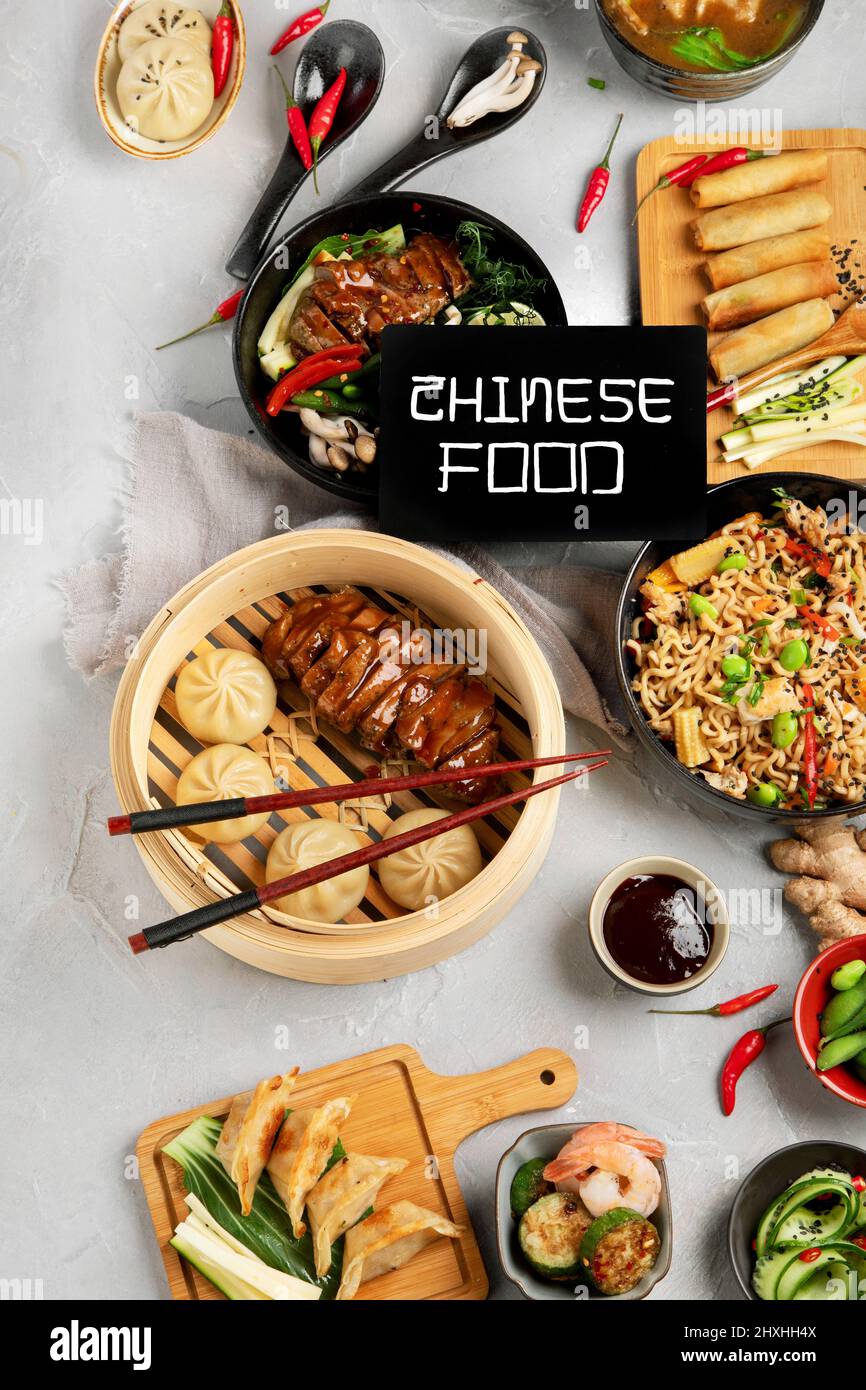 Assorted Chinese food set on light background. Traditional food concept ...