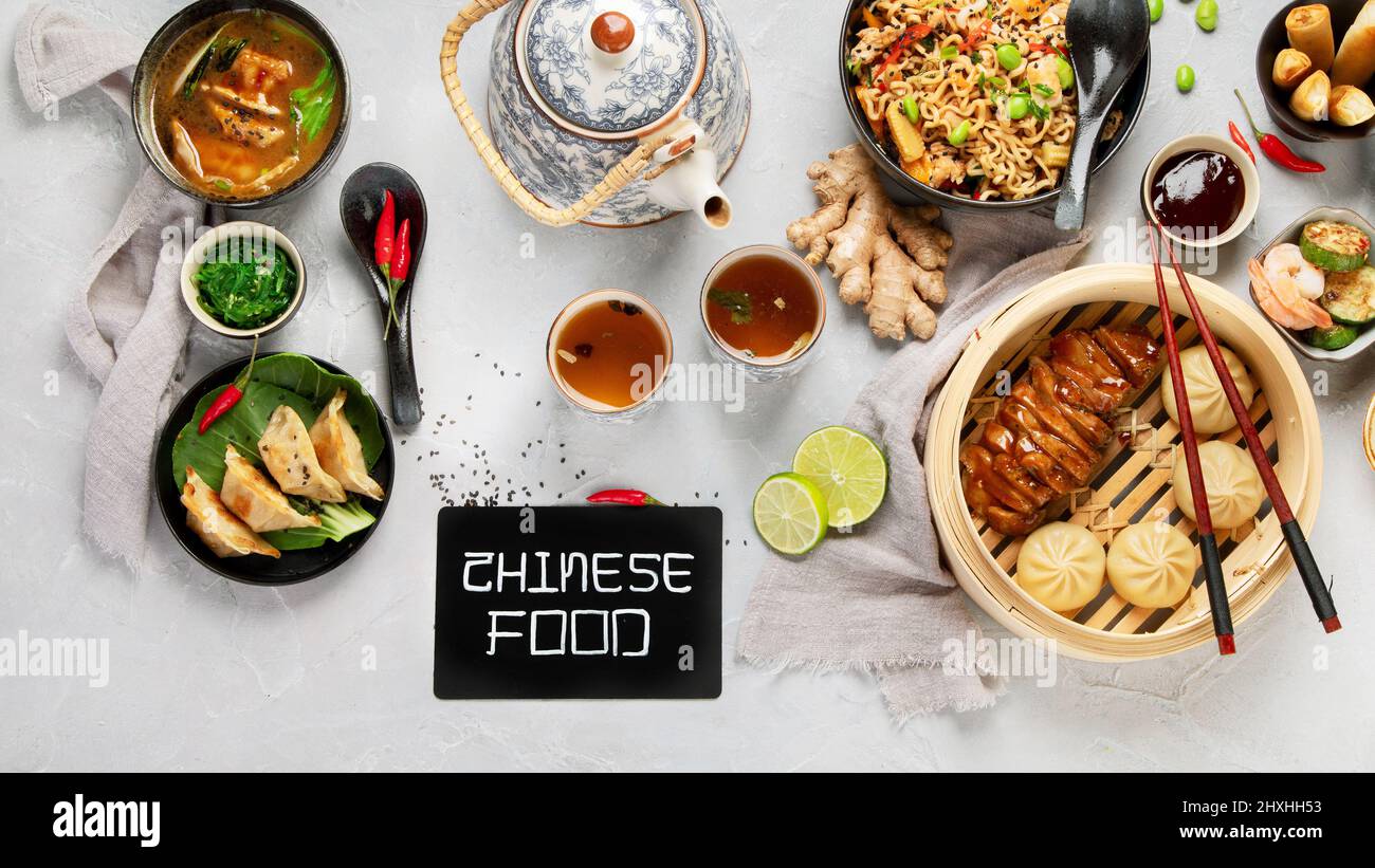 Assorted Chinese food set on light background. Traditional food concept ...