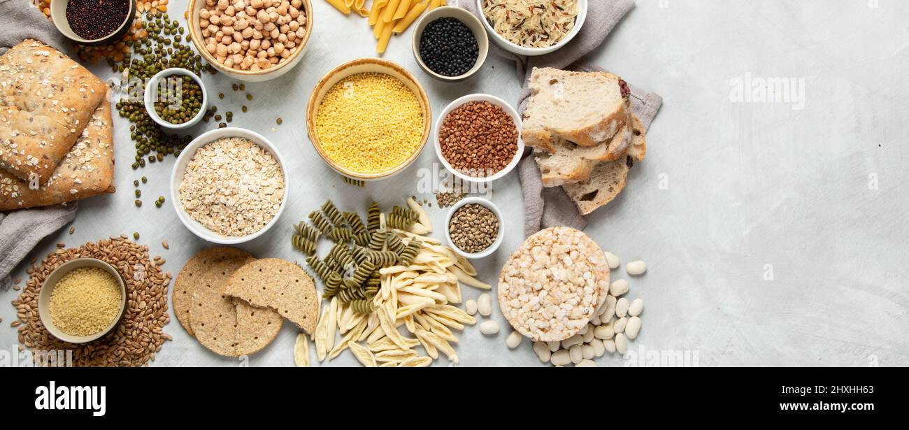 Best sources of carbs on light gray background. Healthy food concept ...