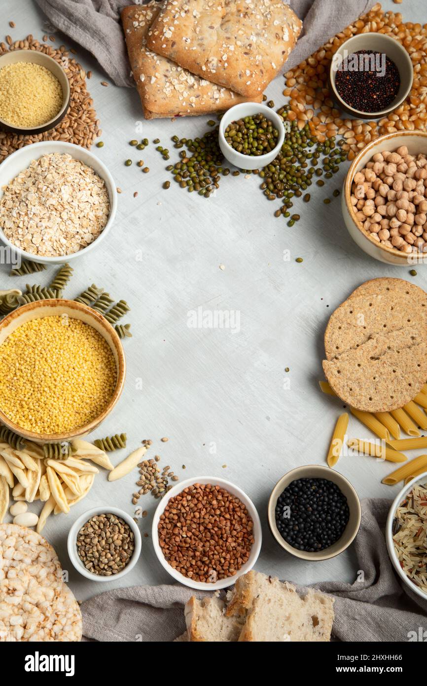 Best sources of carbs on light gray background. Healthy food concept ...