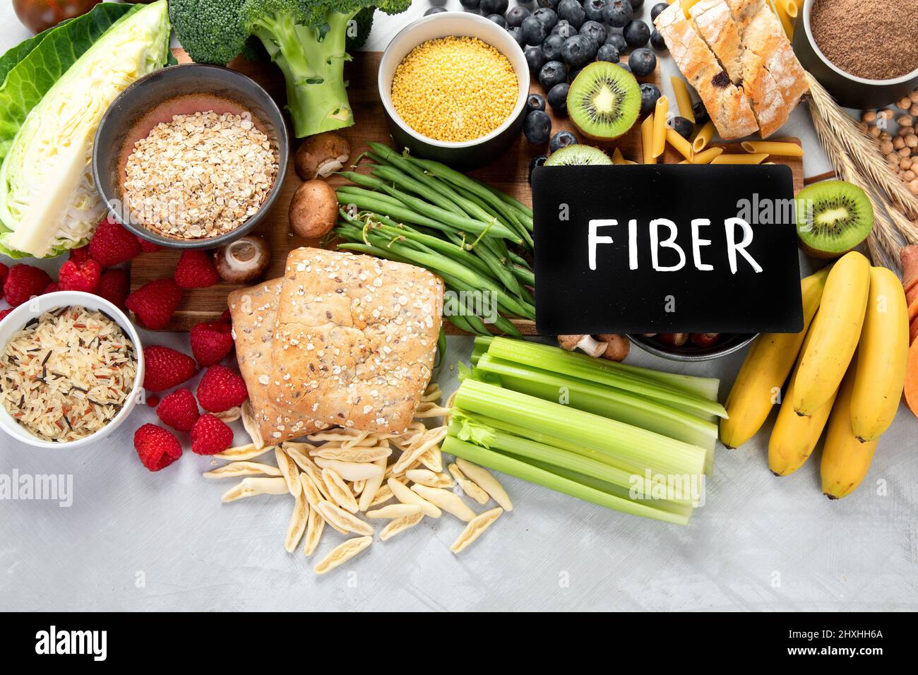 Foods high in fiber on gray background. Healthy food concept. Top view ...