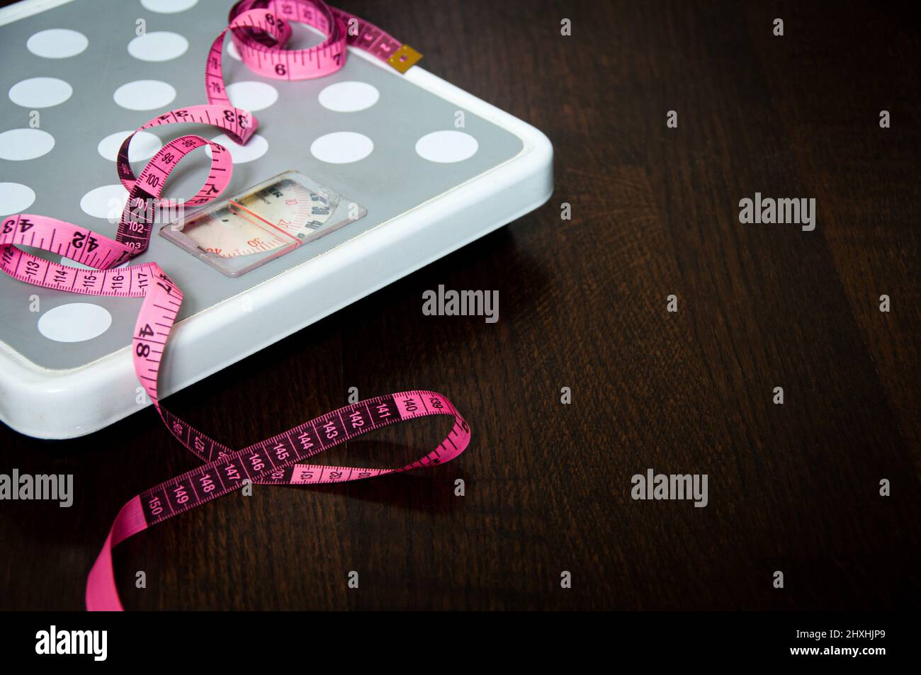 Side view of weight scale measure tap and scale machine. Diet and ...