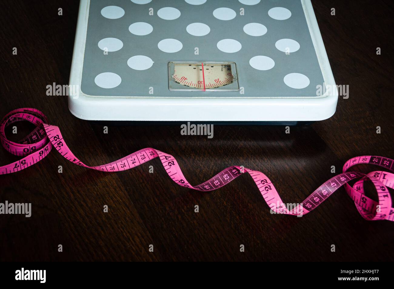 Side view of weight scale measure tap and scale machine. Diet and ...