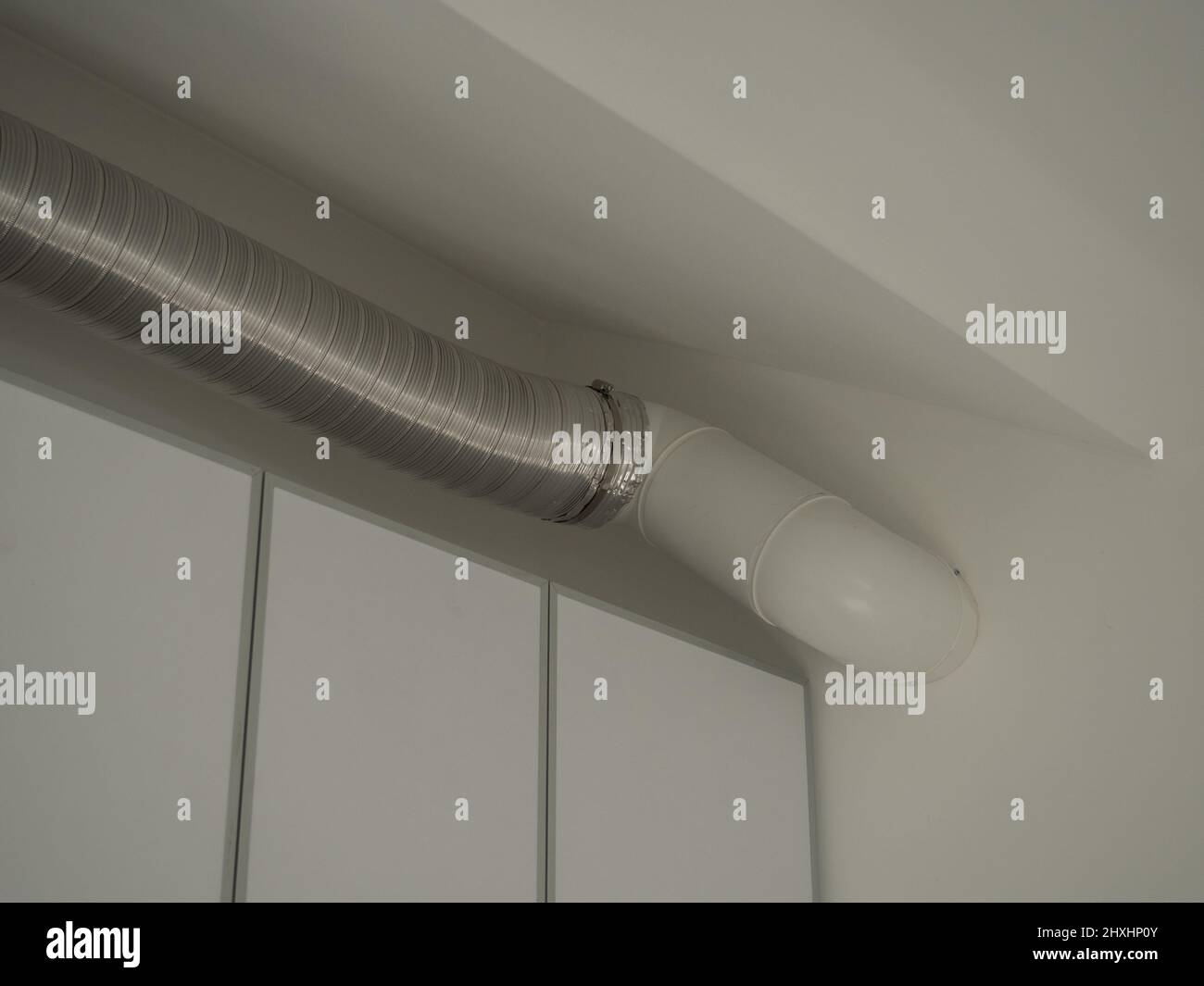 Home renovation and installation in white room Stock Photo - Alamy